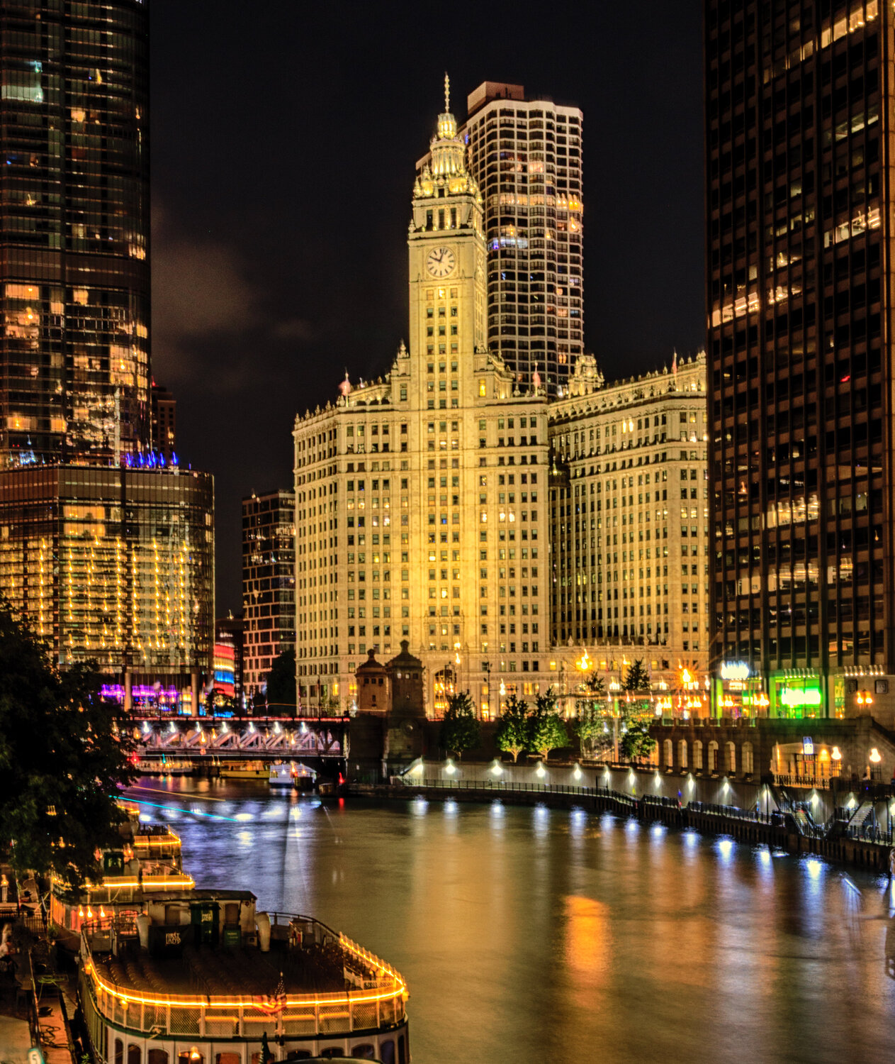 Chicago River At Night with Wrigley Building lit up in the distance. On ...